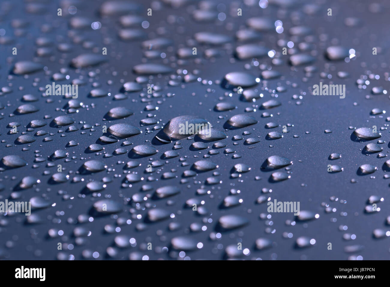 Gray water drops background Stock Photo - Alamy