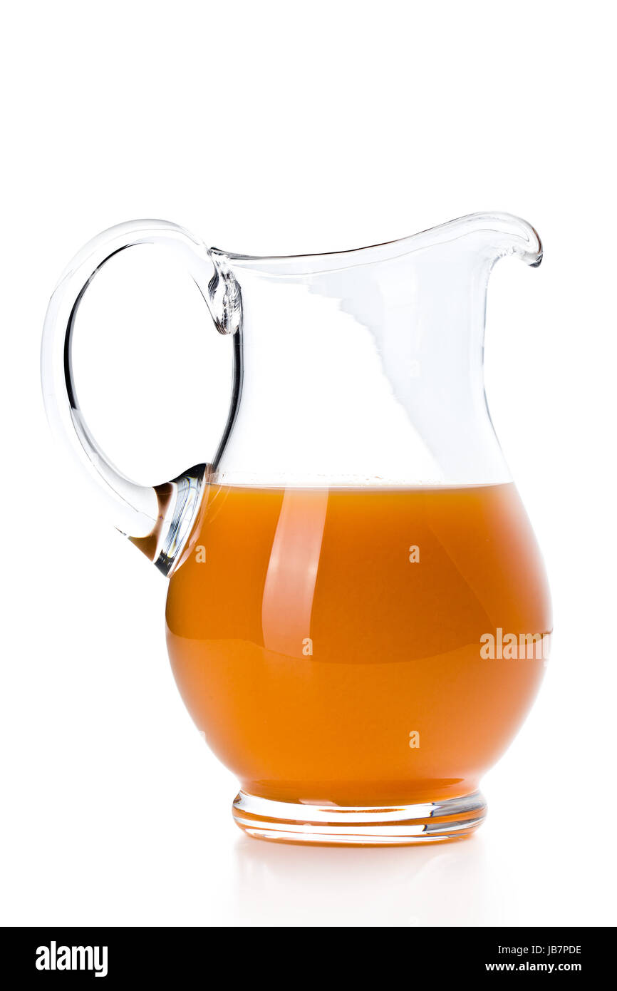 carrot juice in pitcher on white background Stock Photo - Alamy