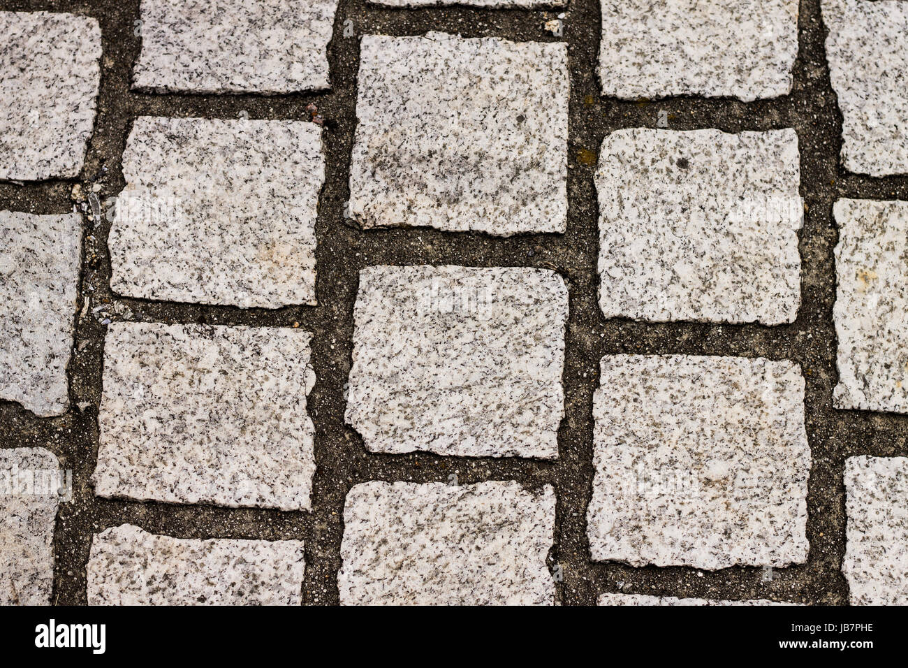 Gray bricks on a path Stock Photo - Alamy