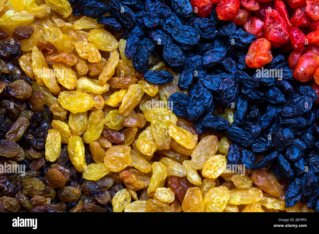Background dried raisin grapes close up shot Stock Photo - Alamy