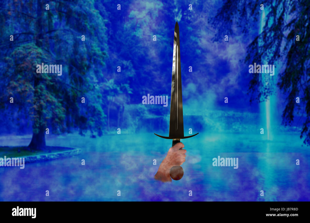 Male hand holding a Sword coming out of a foggy lake Stock Photo - Alamy