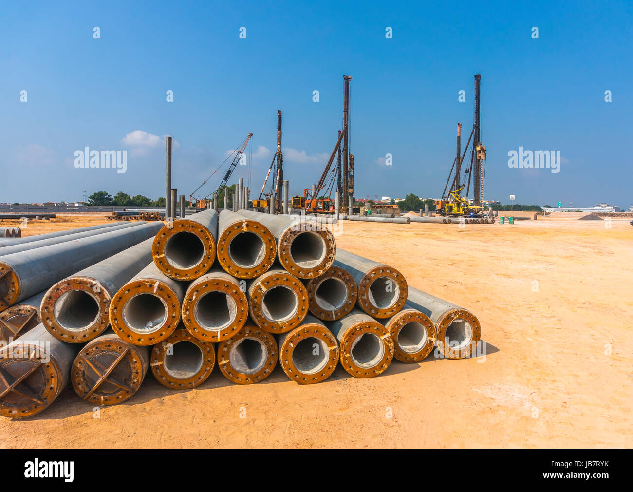 Piling work at construction site with blue skies background Stock Photo ...