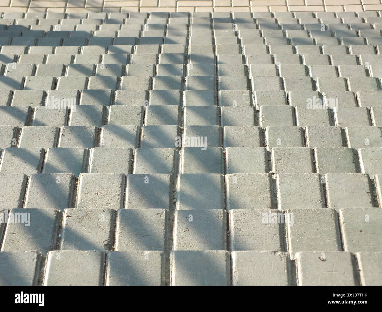 stages of paving stones as a background Stock Photo - Alamy