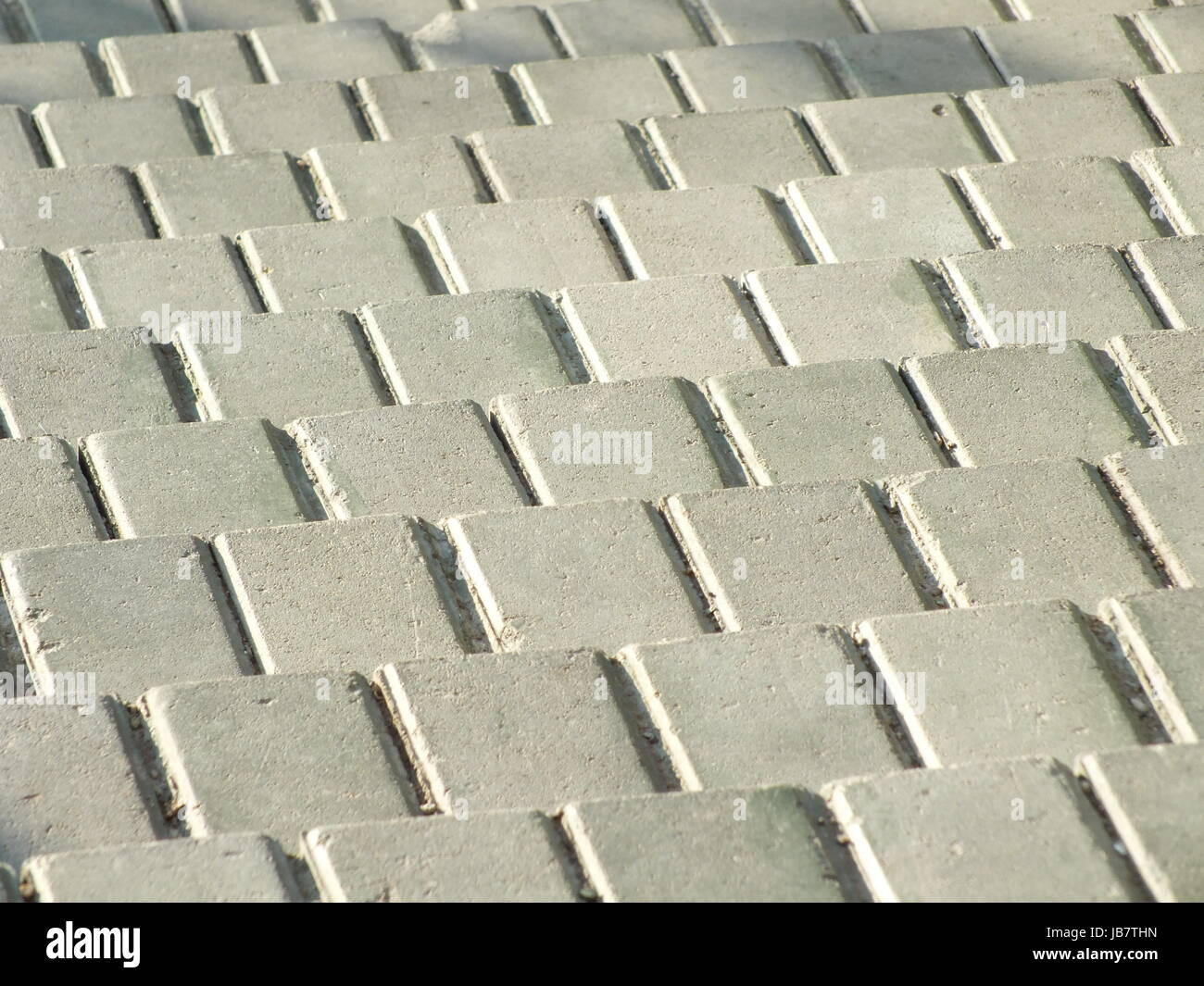 stages of paving stones as a background Stock Photo - Alamy