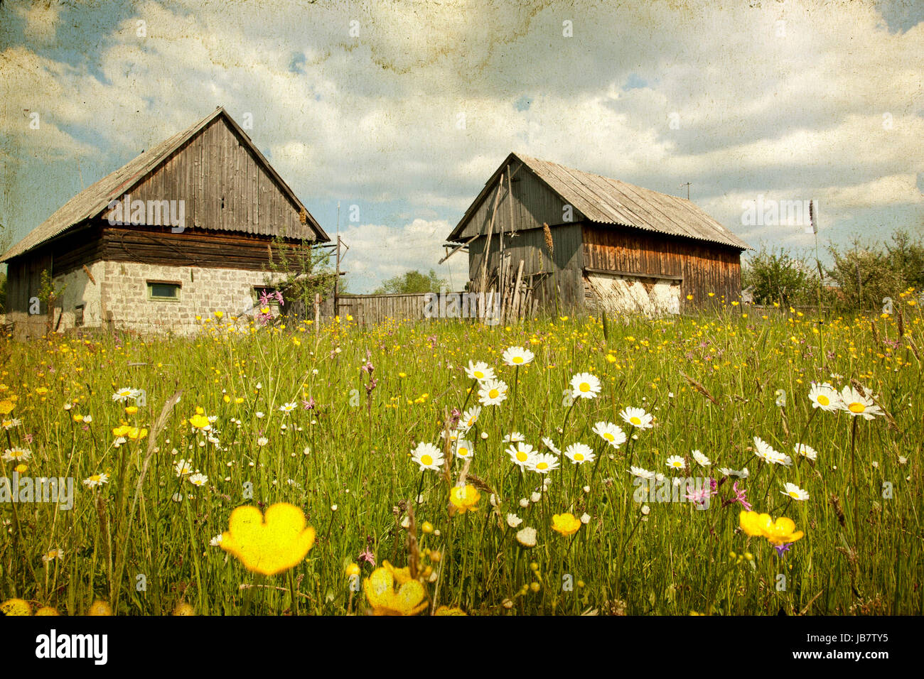 Vintage photo of old houses and spring field in the mountains Stock ...
