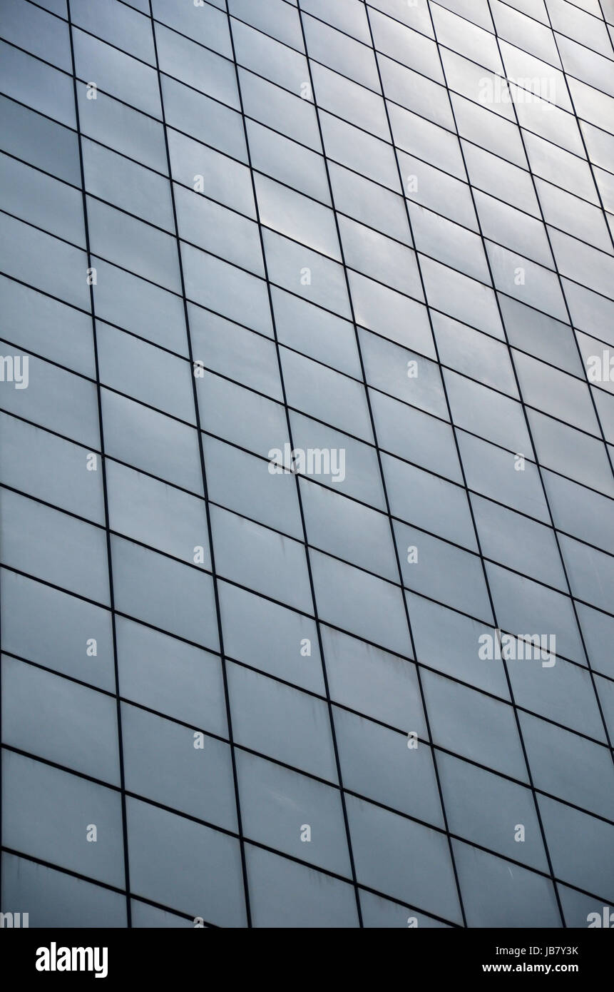 Panel glass windows of modern buildings and sky reflect Stock Photo - Alamy