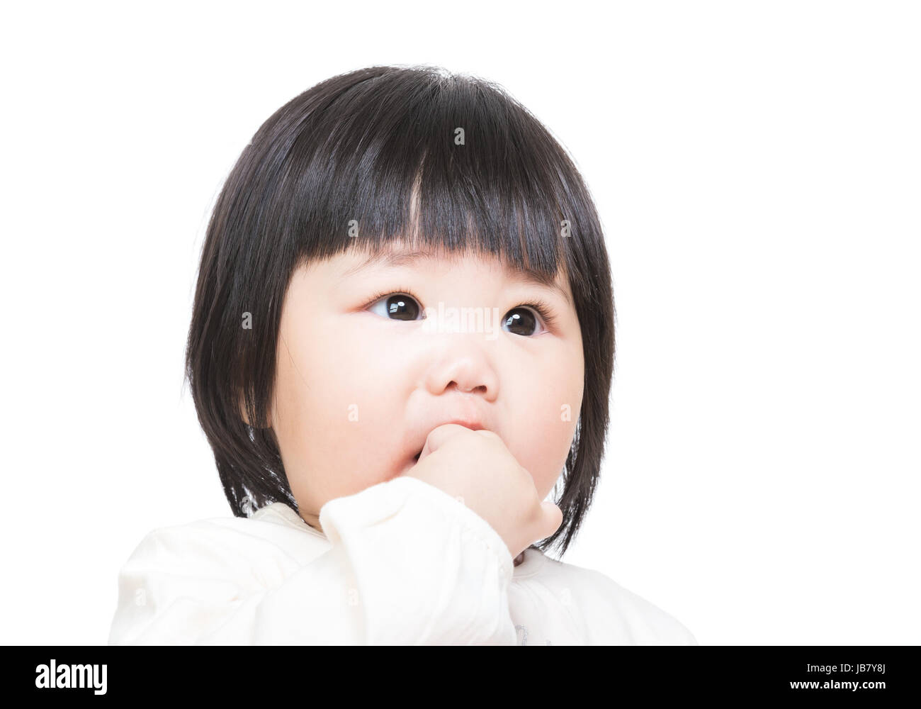 Baby girl bit finger Stock Photo - Alamy