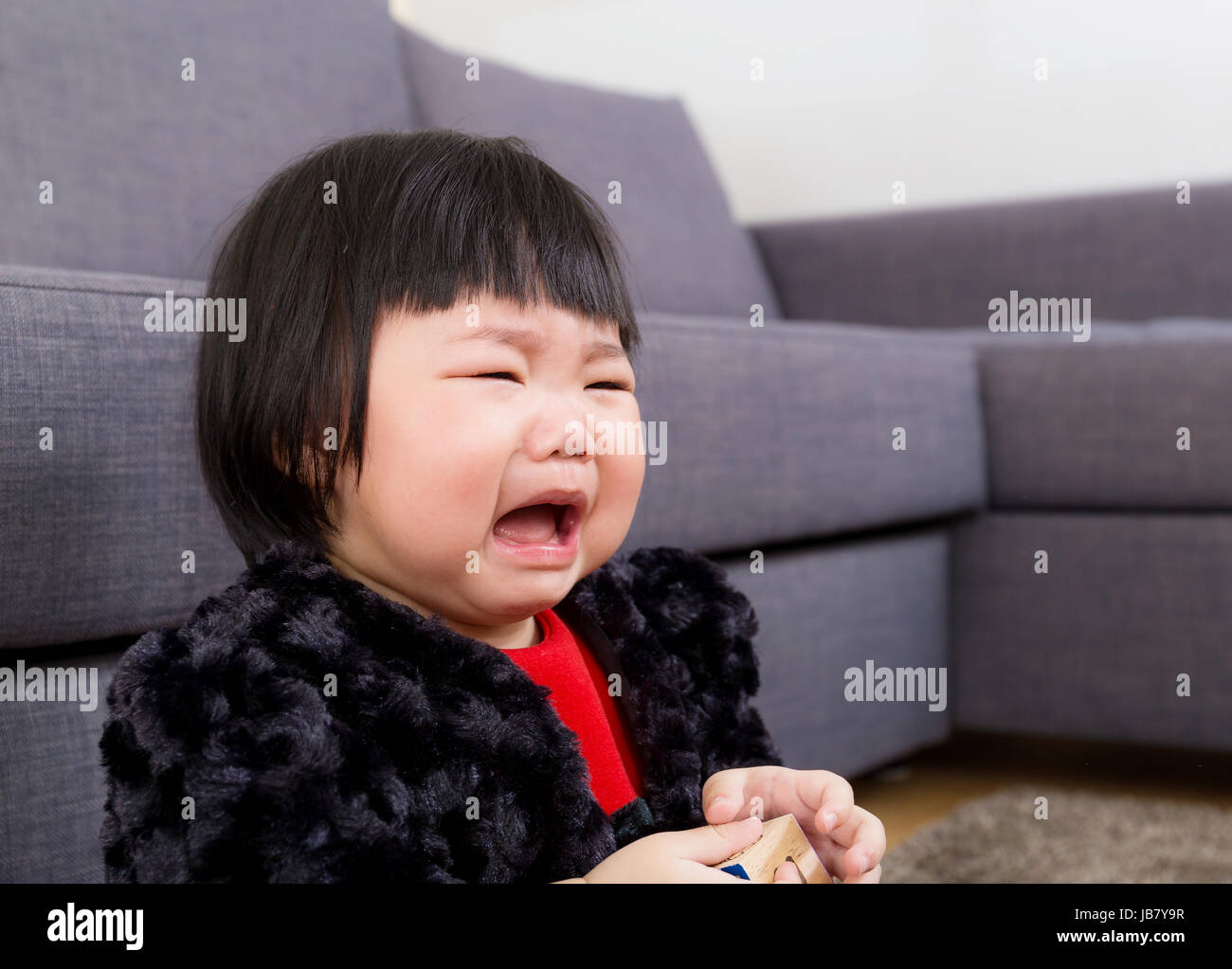 Asian baby crying Stock Photo - Alamy