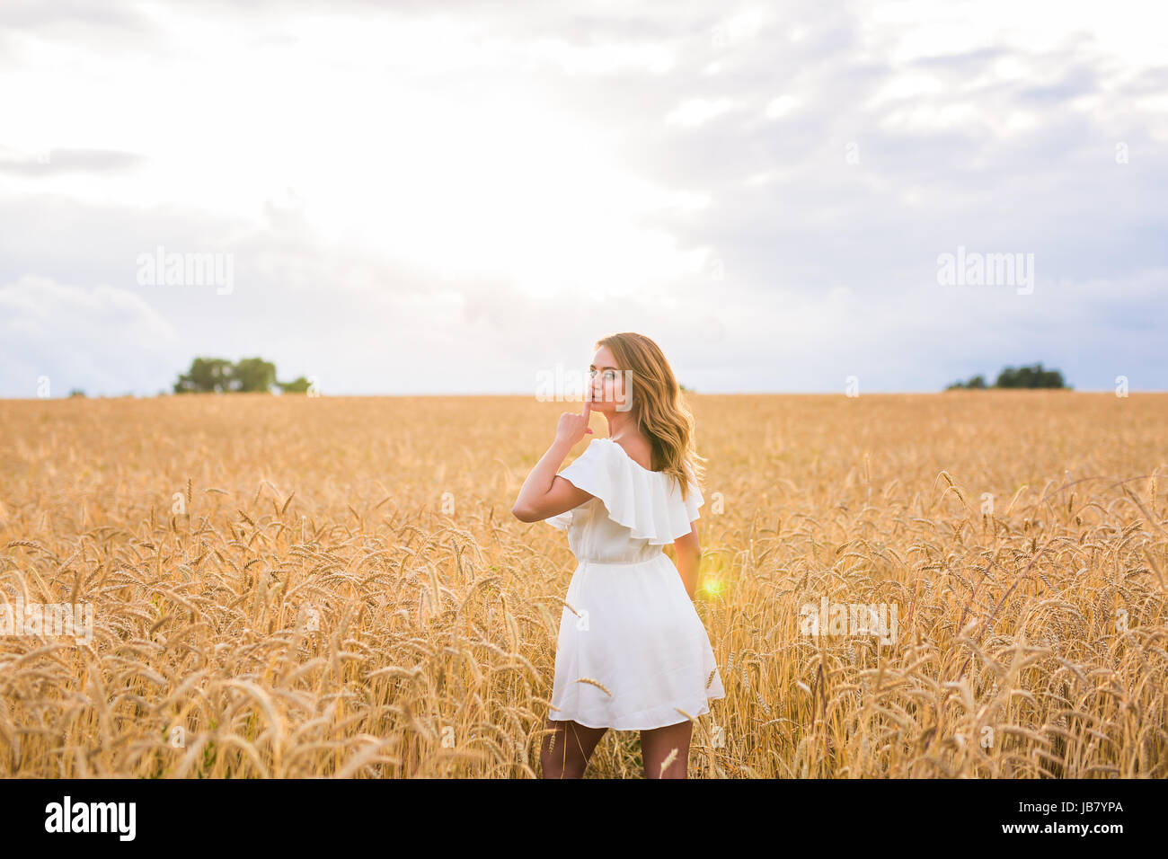 Quiet, secret and trust concept. Woman hand with silence sign symbol on ...