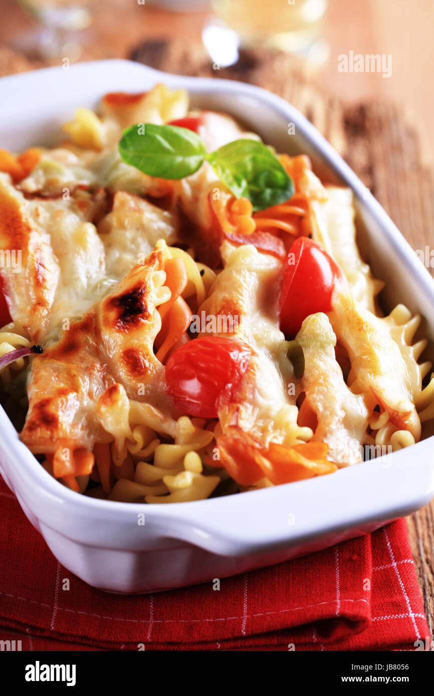 Corkscrew pasta with cherry tomatoes and smoked cheese Stock Photo - Alamy