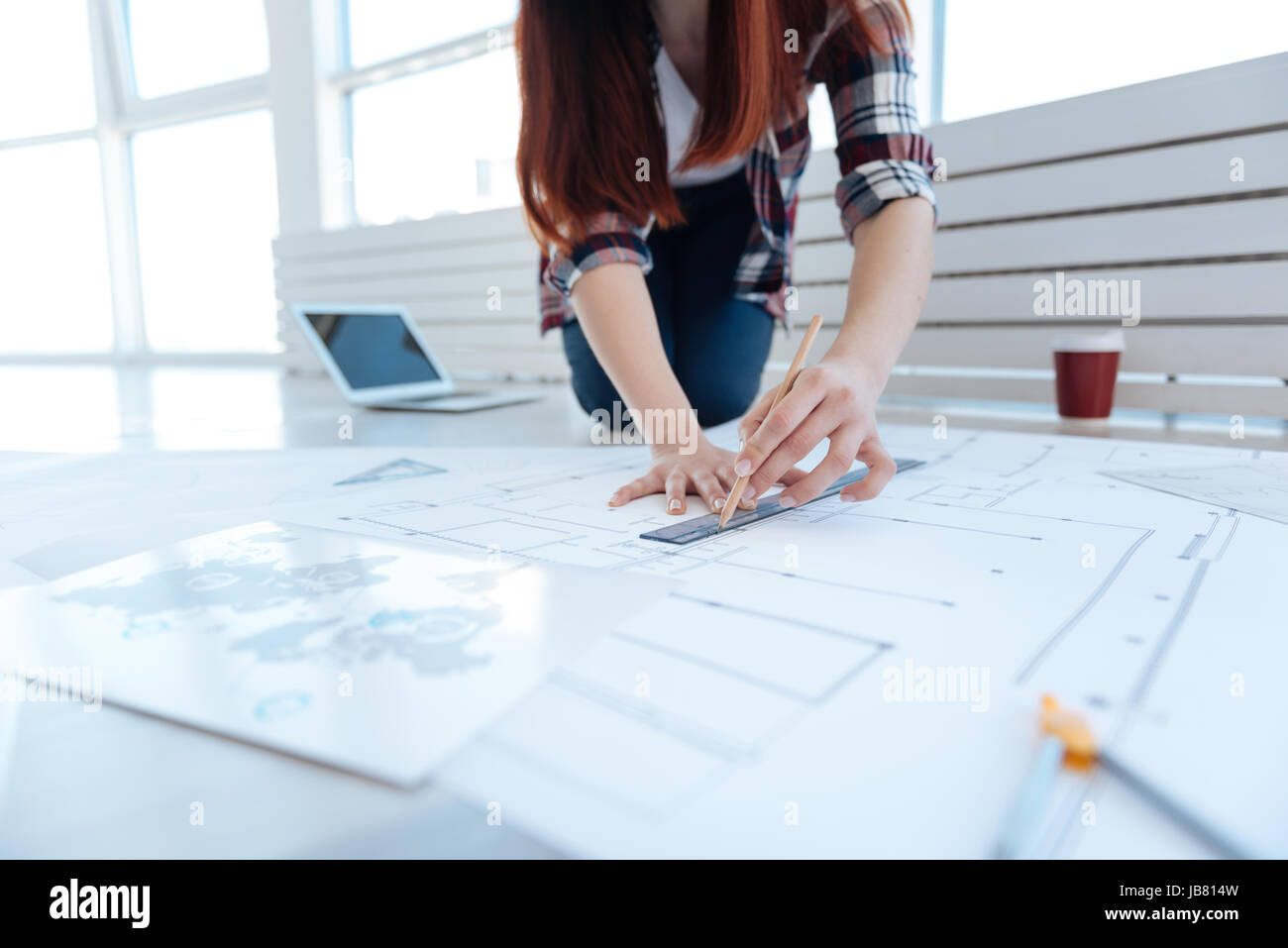 Engineering draft being drawn by a woman Stock Photo - Alamy