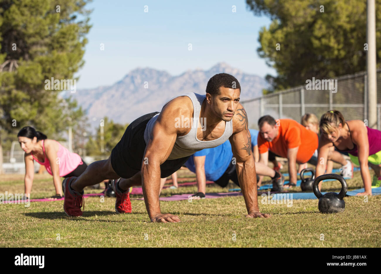 Strong man leading push hi-res stock photography and images - Alamy