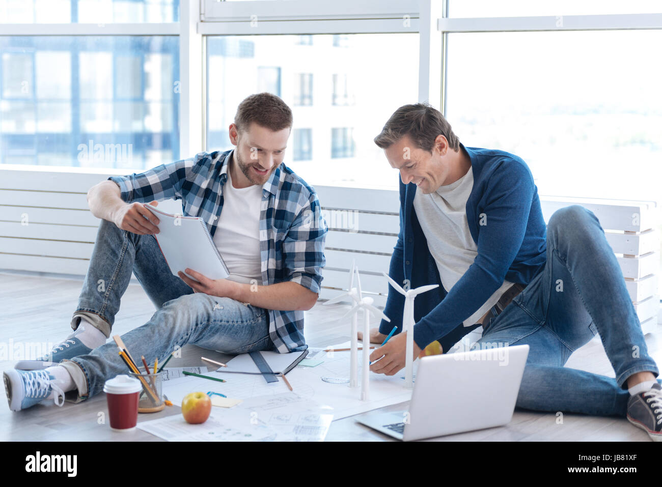 Positive male environmentalists working on the environmental project ...