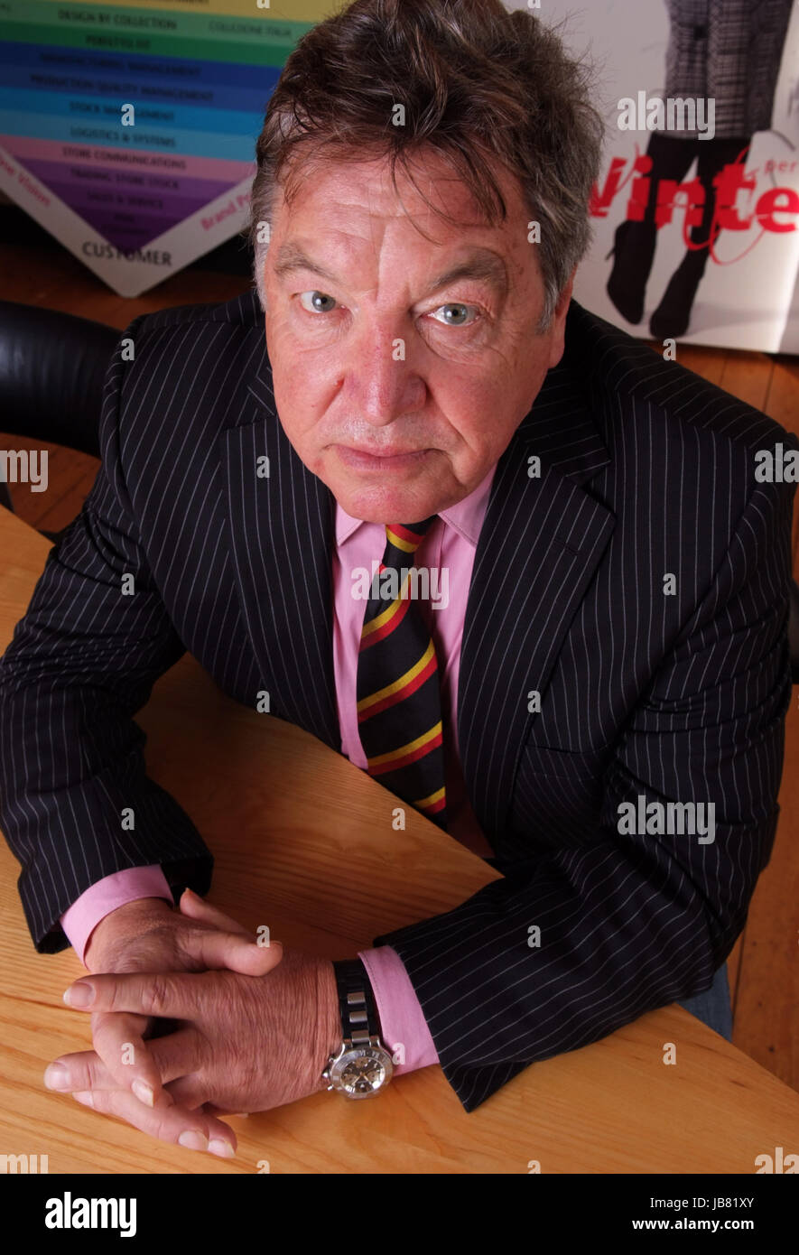 Fashion designer George Davies in his office/studio Stock Photo - Alamy