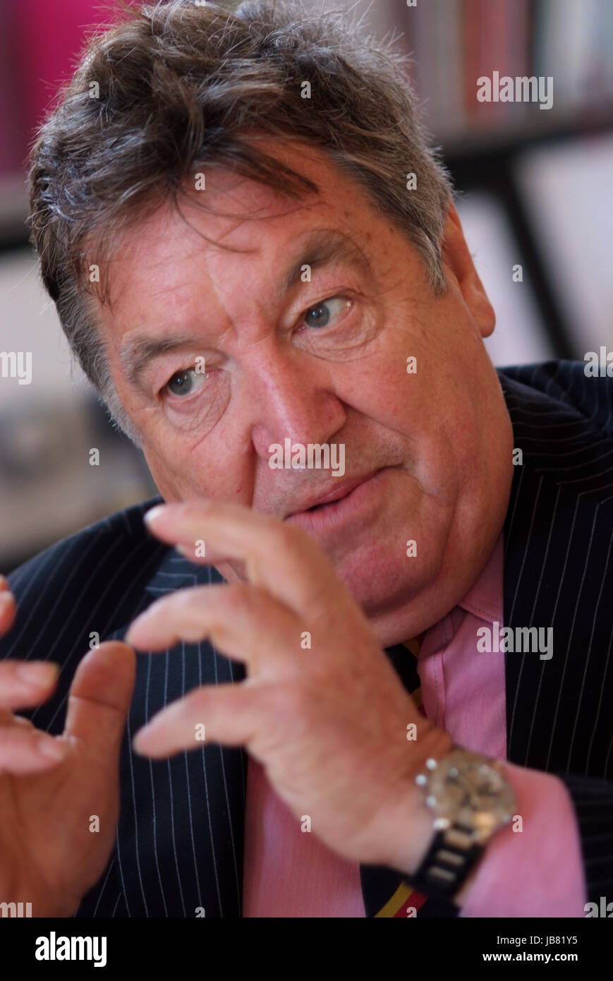 Fashion designer George Davies in his office/studio Stock Photo - Alamy