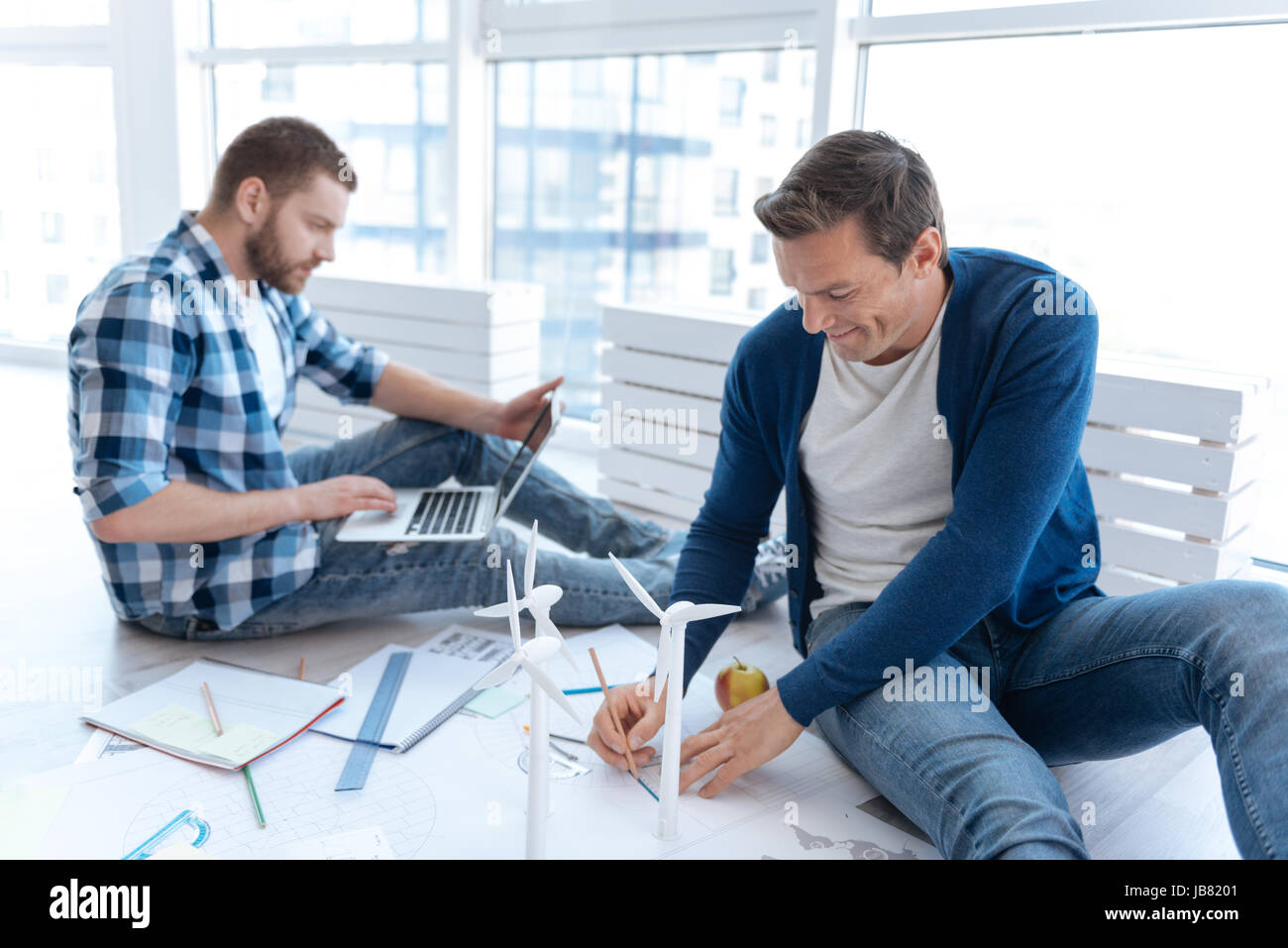 Handsome male engineer concentrating on his work Stock Photo - Alamy
