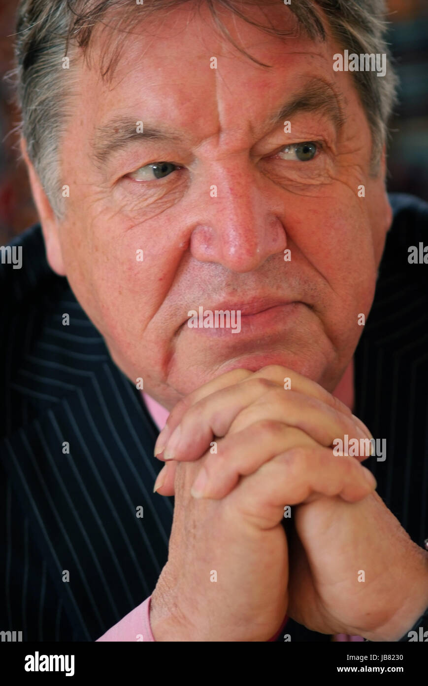 Fashion designer George Davies in his office/studio Stock Photo - Alamy