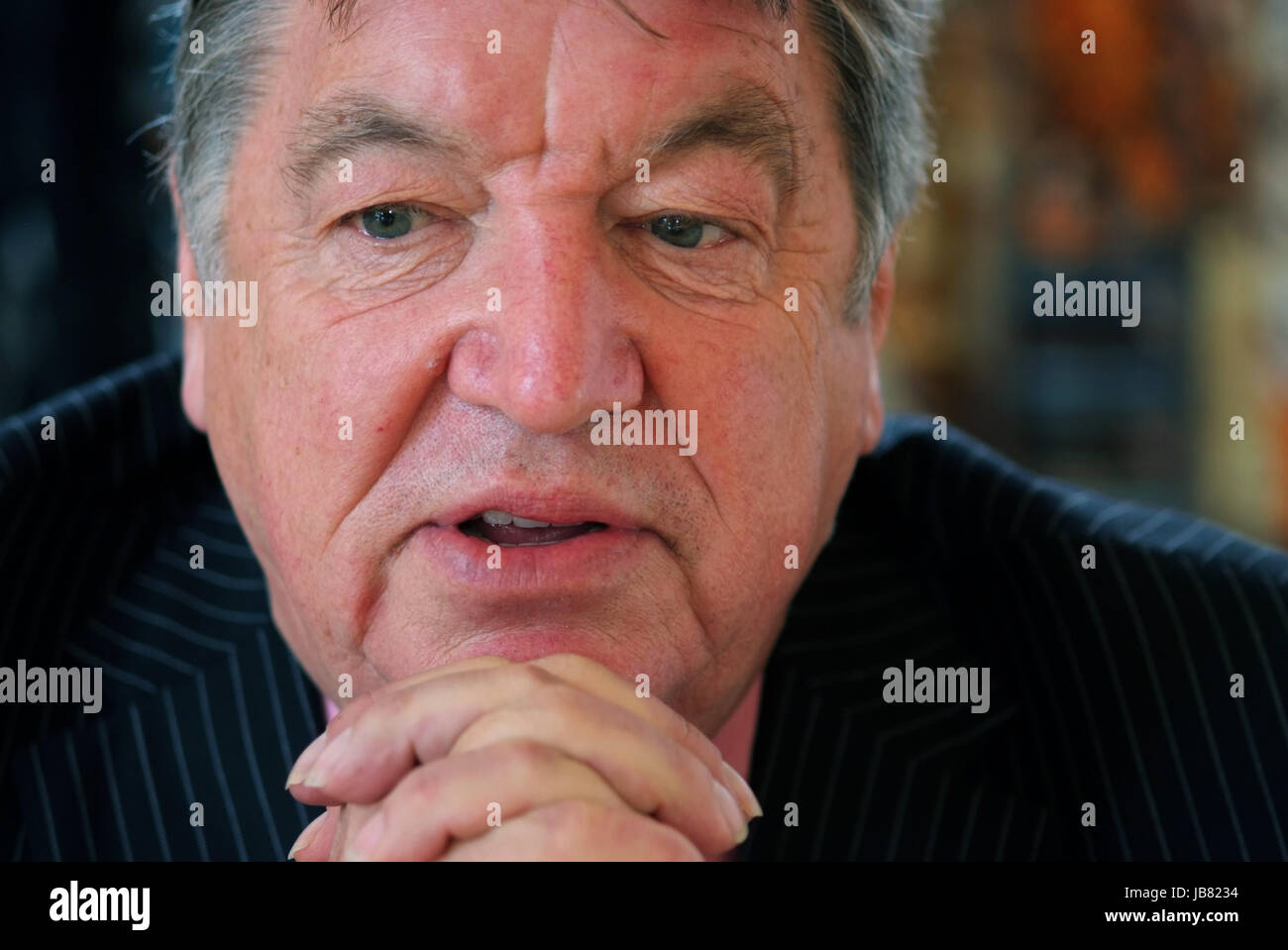 Fashion designer George Davies in his office/studio Stock Photo - Alamy