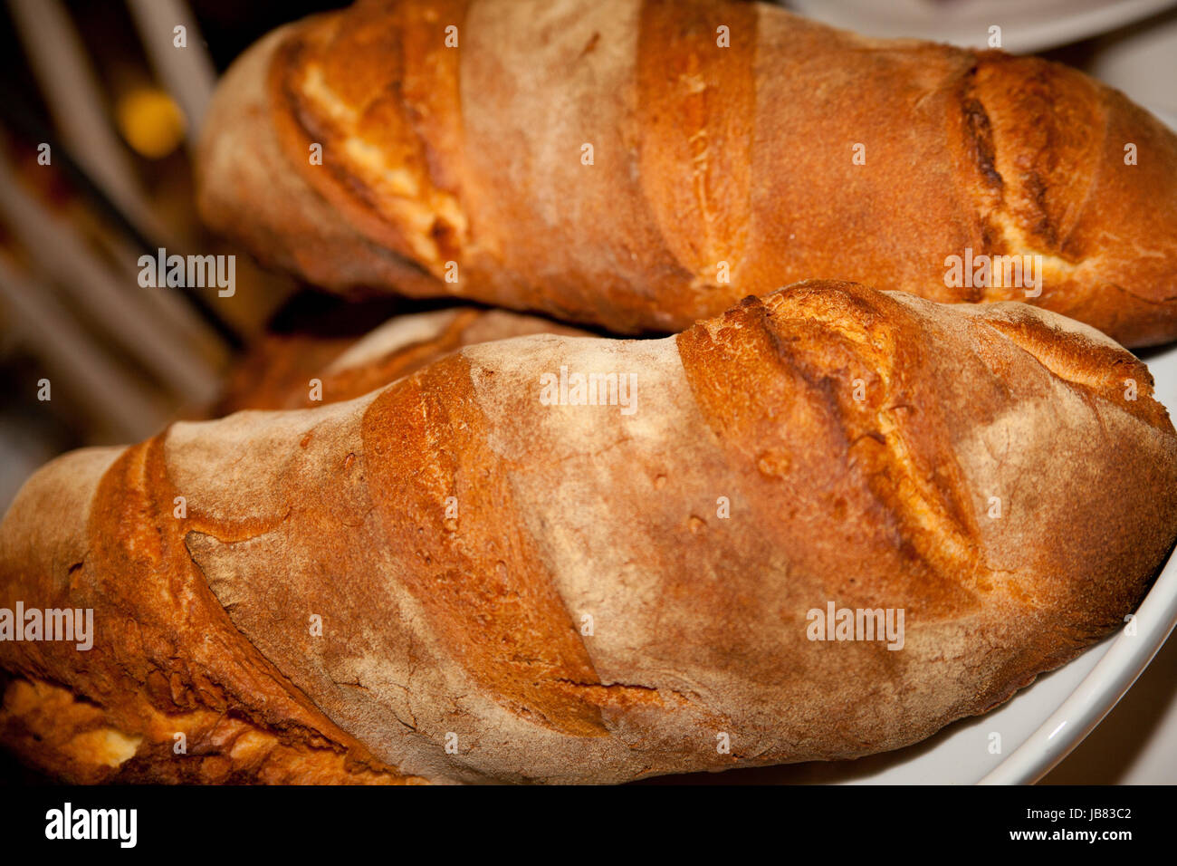 hand shaped loaves of bread Stock Photo - Alamy