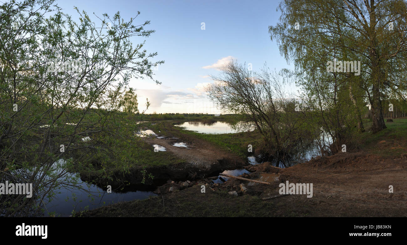 Spring countryside view with dirty road hi-res stock photography and ...