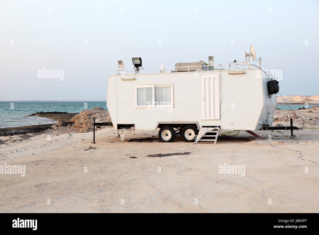 Trailer at the Arabian Gulf beach in Qatar, Middle East Stock Photo - Alamy