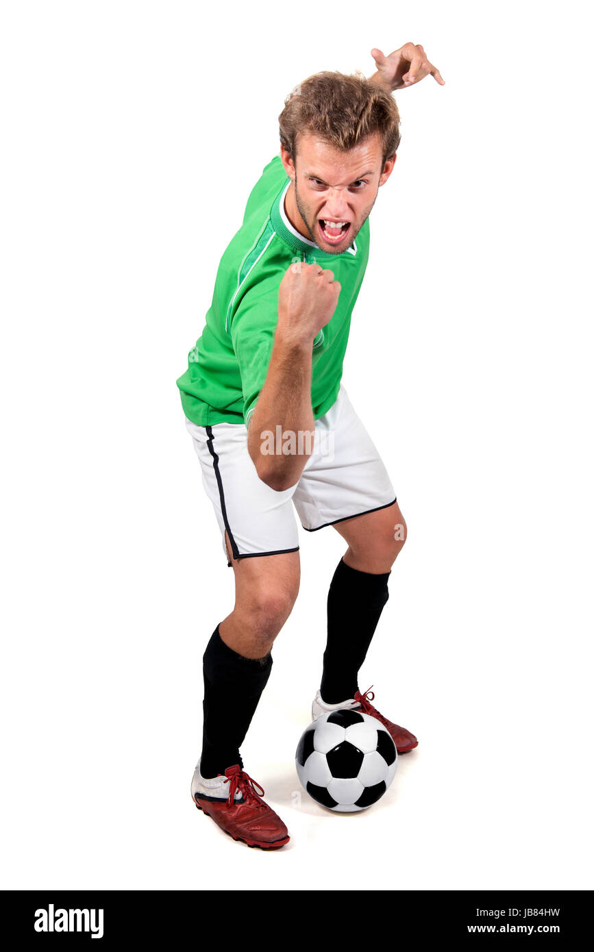 Football player with a ball isolated in white Stock Photo - Alamy