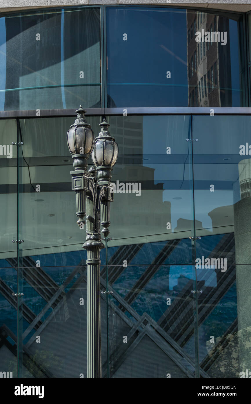 Traditional street lamp in front of modern building Stock Photo - Alamy