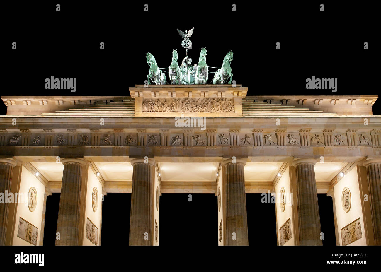 Brandenburg Gate at night, a former city gate and one of the main ...