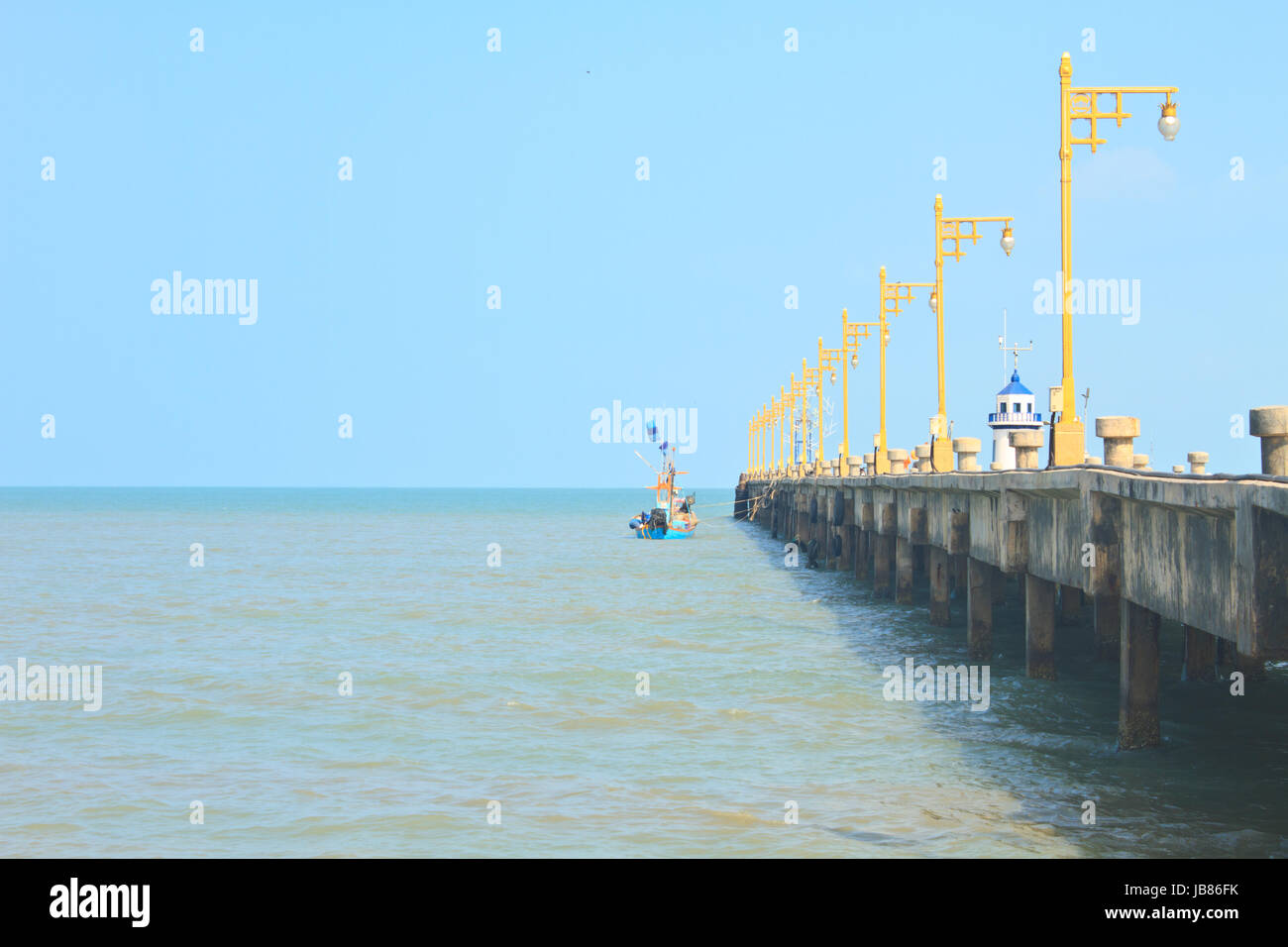 Old public pier and light pole on Southern of Thailand Stock Photo - Alamy
