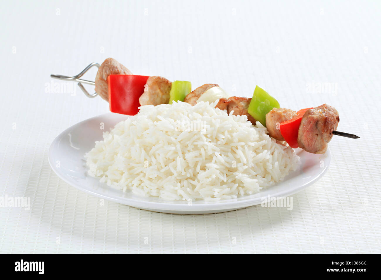 Shish kebab with white rice Stock Photo - Alamy