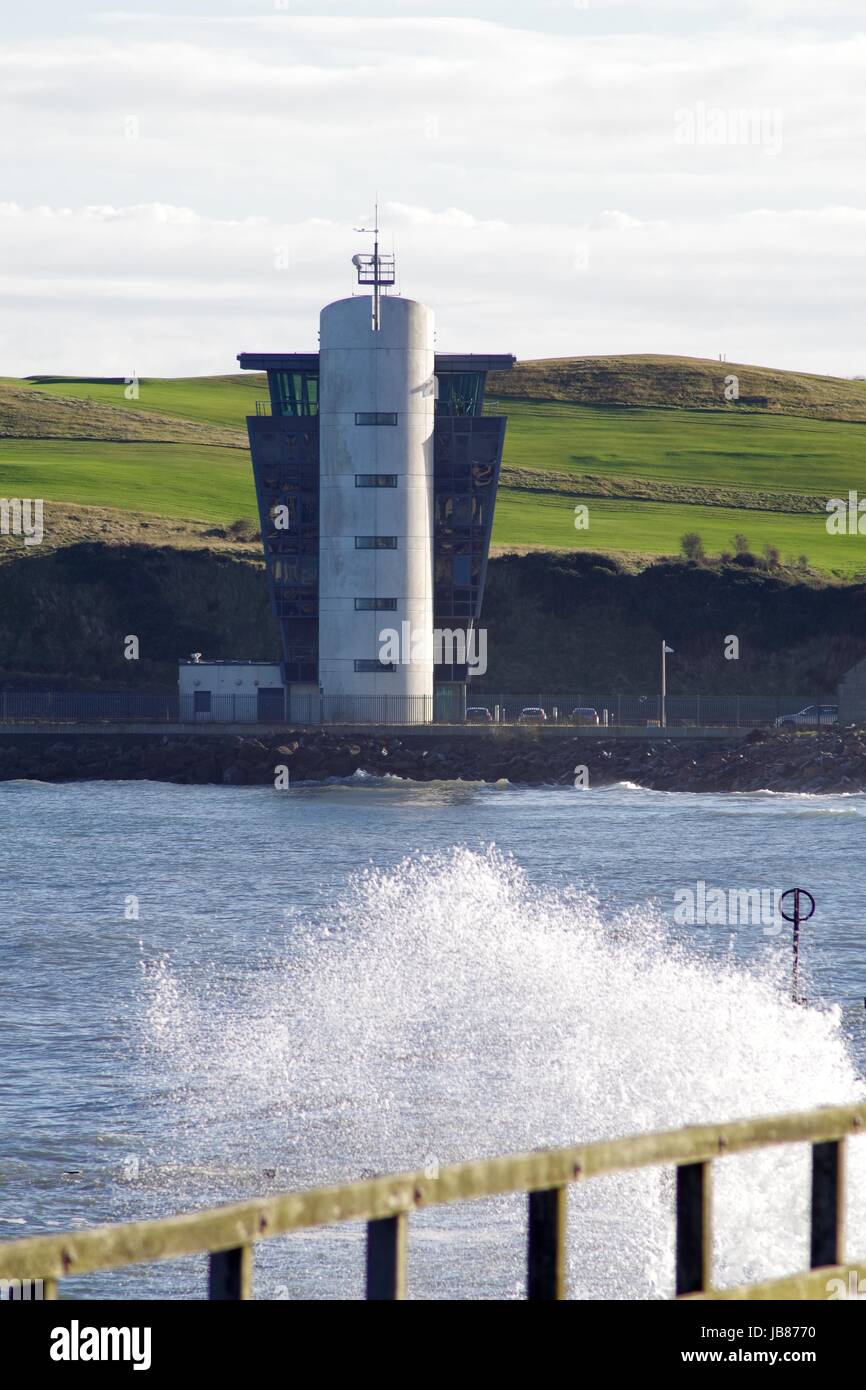 Wave Splashing up the Sea Wall with Aberdeen Harbour Control Tower in ...