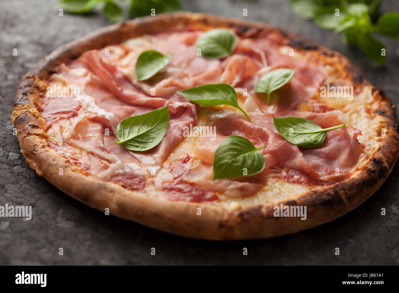 rustic italian pizza with mozzarella, cheese and basil leaves Stock ...