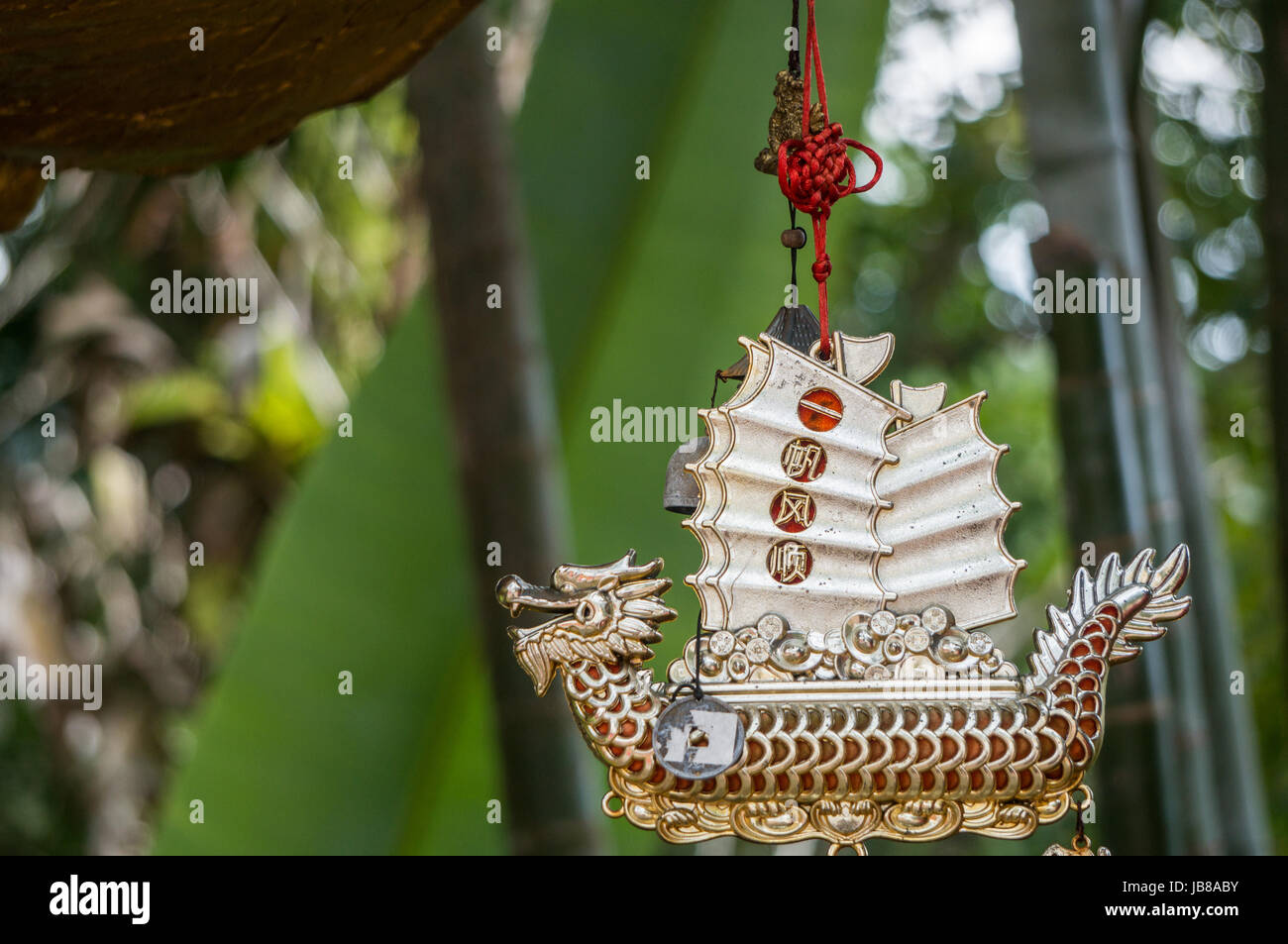 Small chinese dragon ship decoration Stock Photo - Alamy