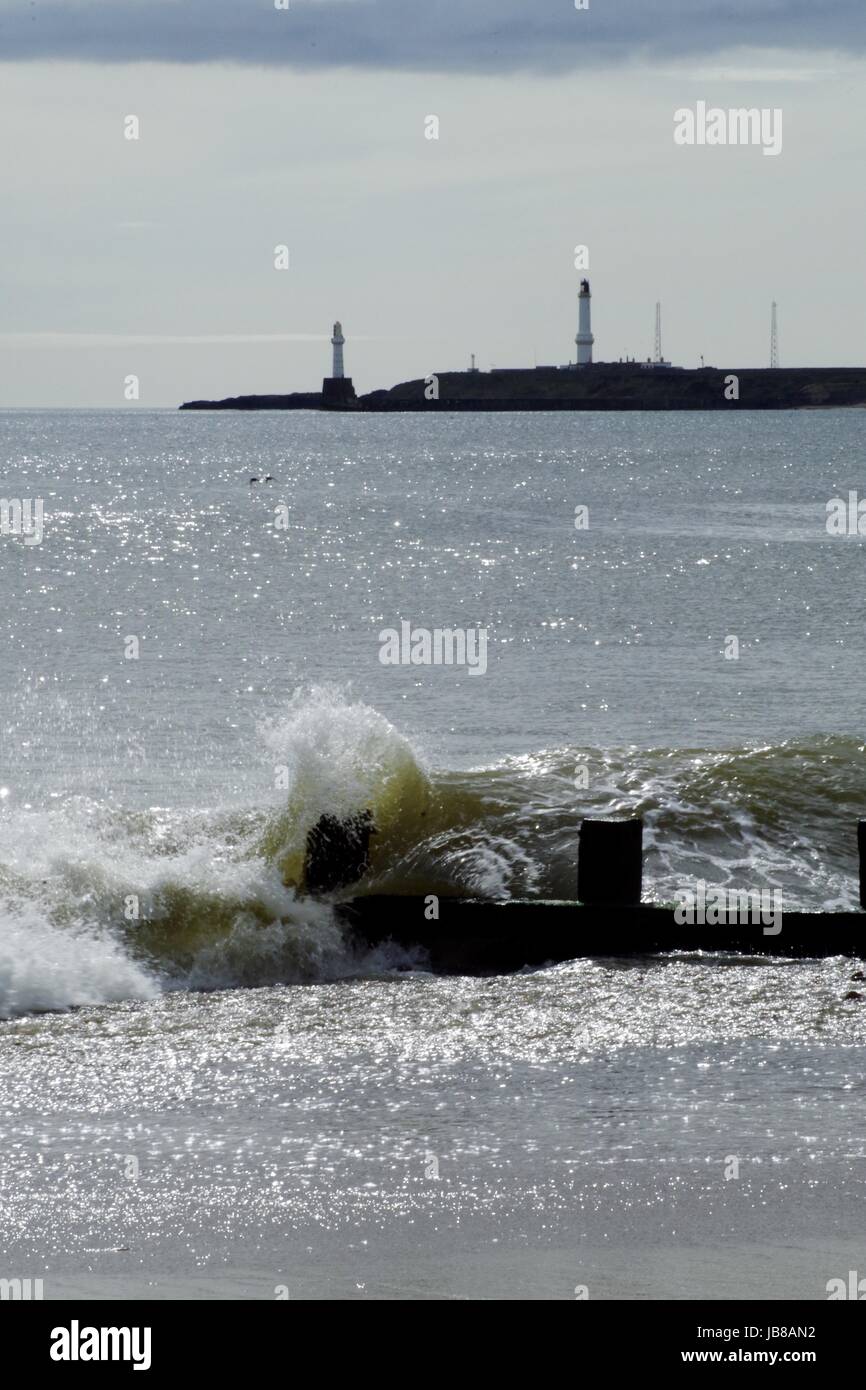 North Sea Waves Striking the Beach at Aberdeen, with Girdle Ness ...