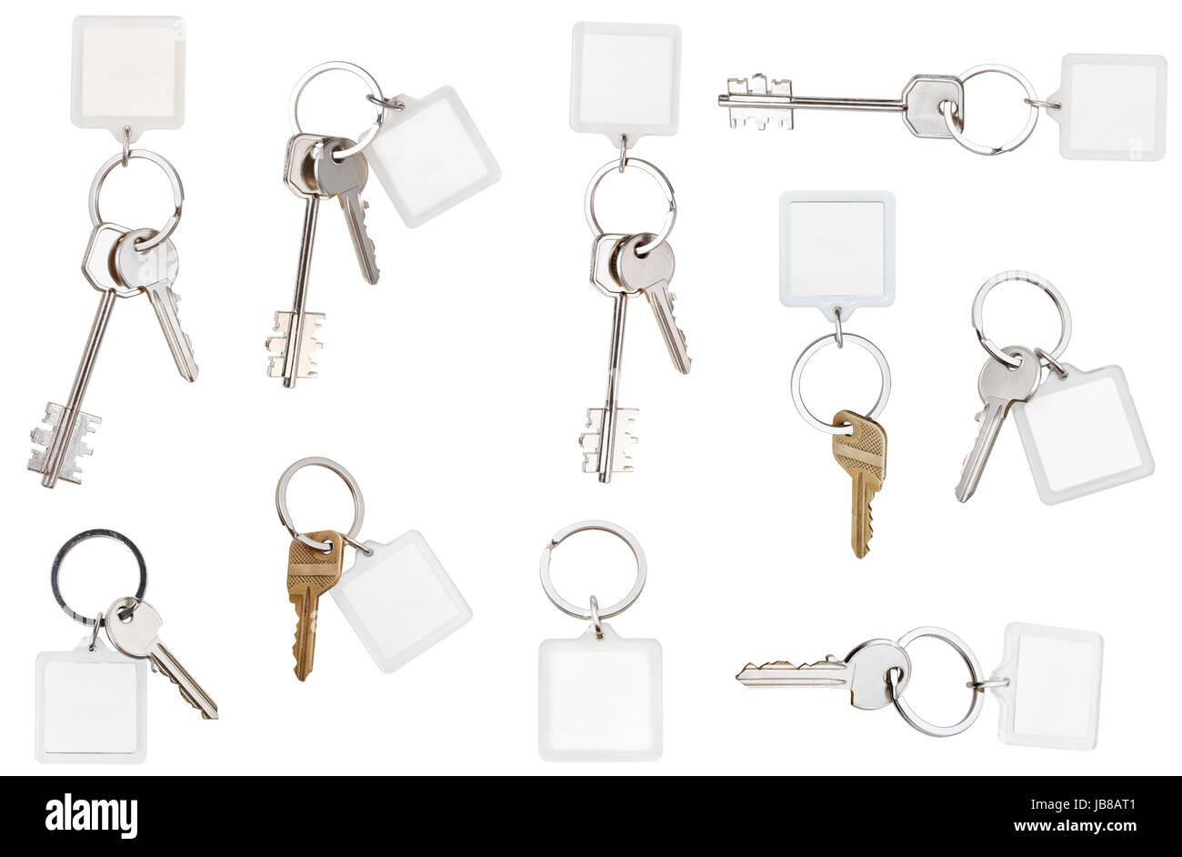 set of keys on ring with blank keychain isolated on white background ...