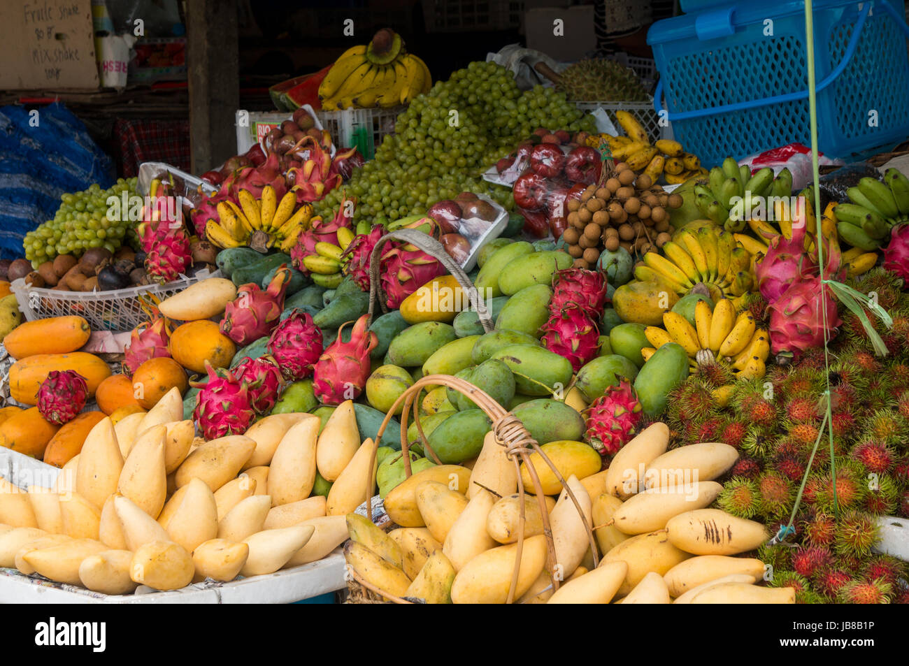 Fruits on display at a small market in Thailand Stock Photo - Alamy