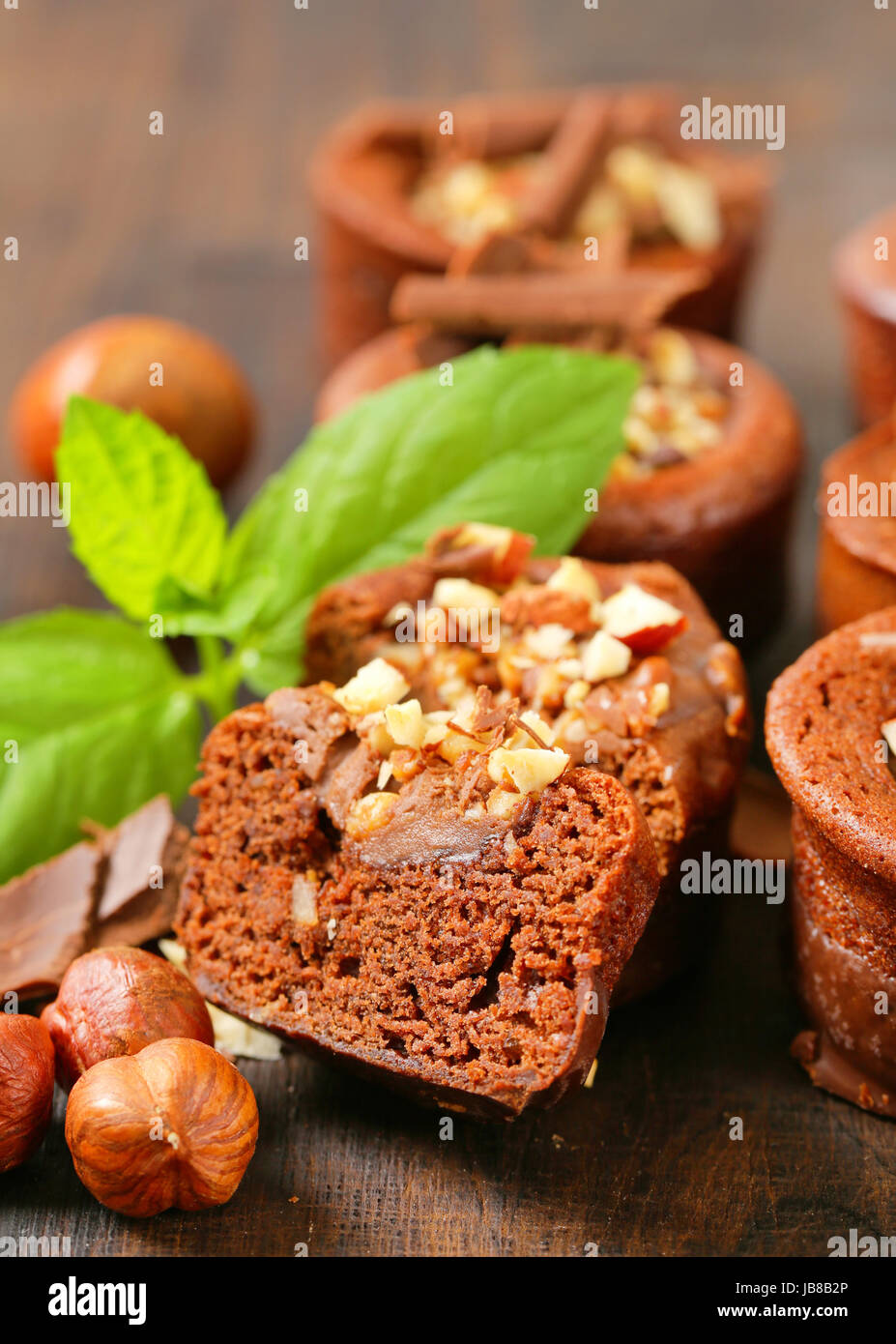 Mini chocolate cakes with hazelnut filling Stock Photo - Alamy