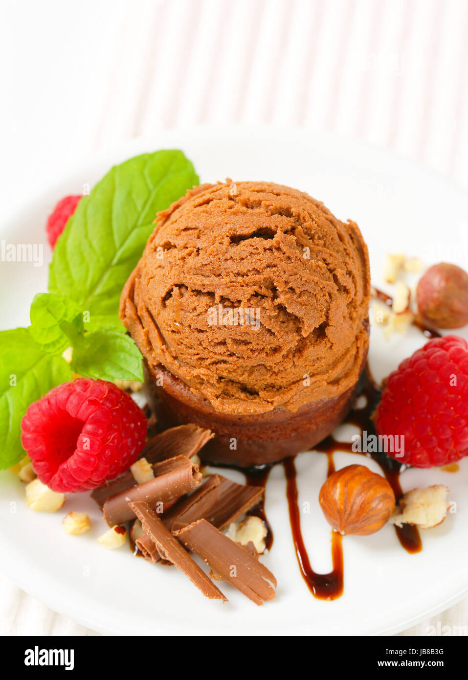 Mini chocolate cake and scoop of ice cream Stock Photo - Alamy