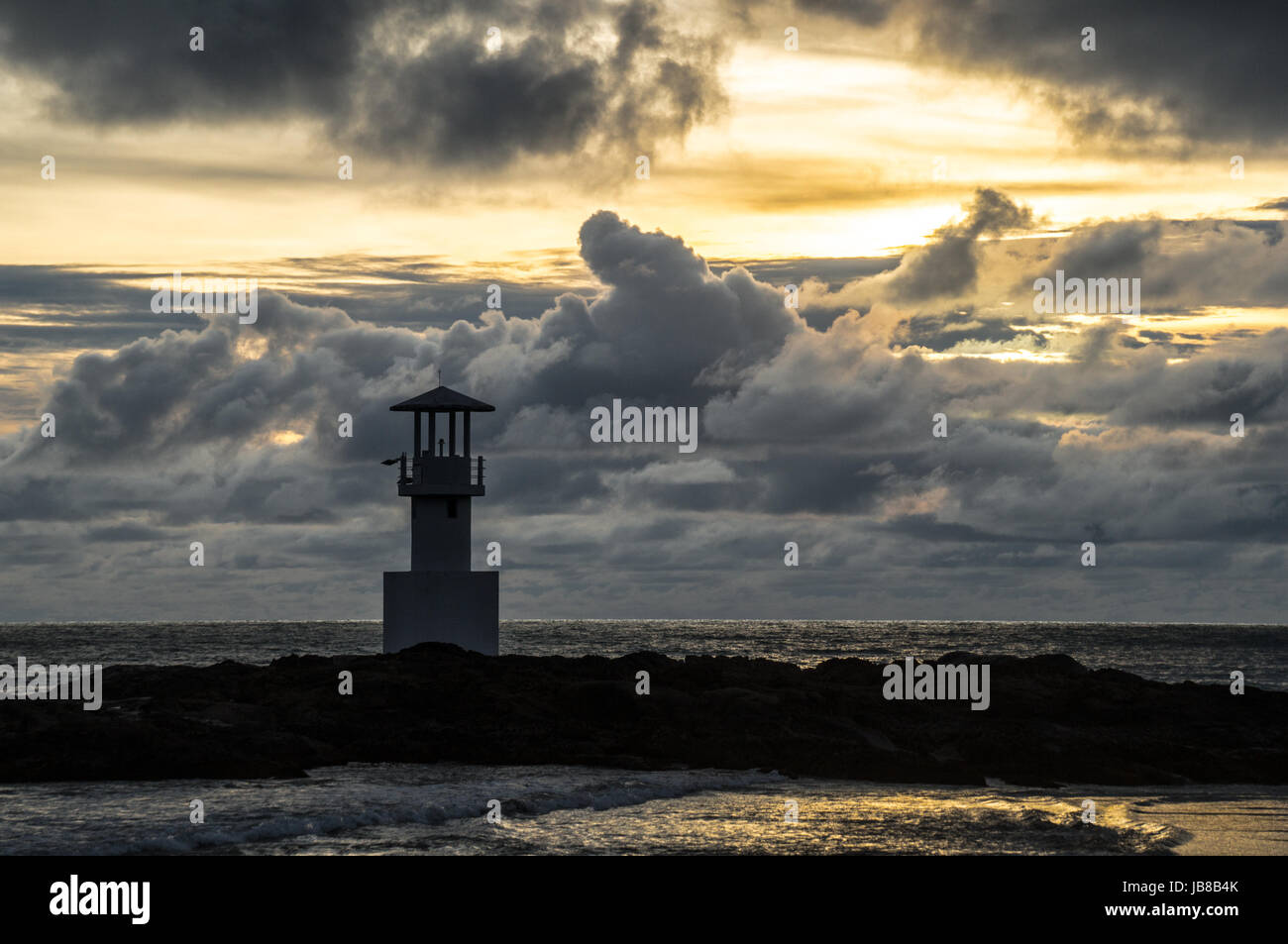Light beacon at sunset Stock Photo - Alamy