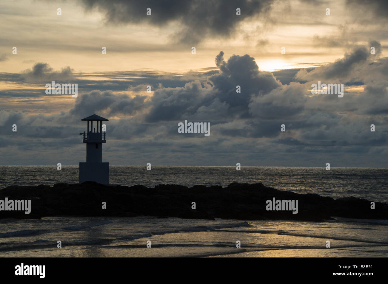 Light beacon at sunset Stock Photo - Alamy