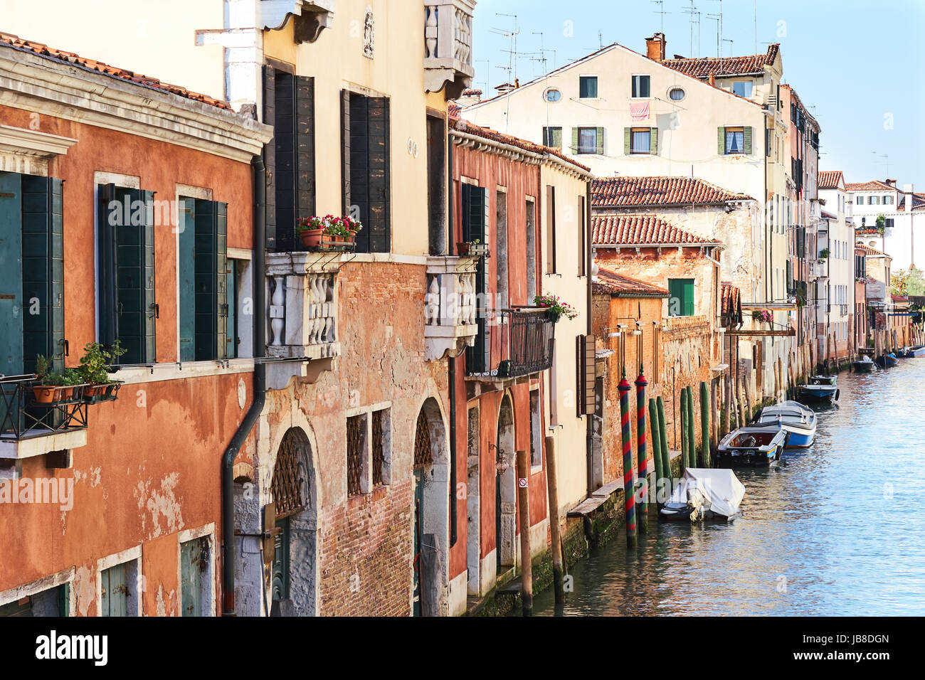 Colorful facades of old medieval houses in Venice, Italy Stock Photo ...