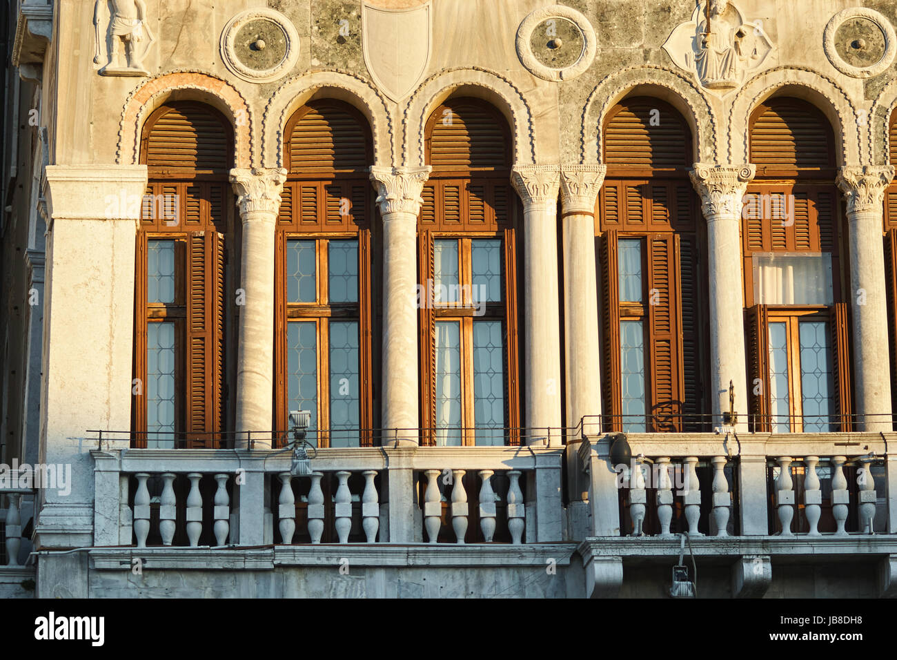Colorful facades of old medieval houses in Venice, Italy Stock Photo ...