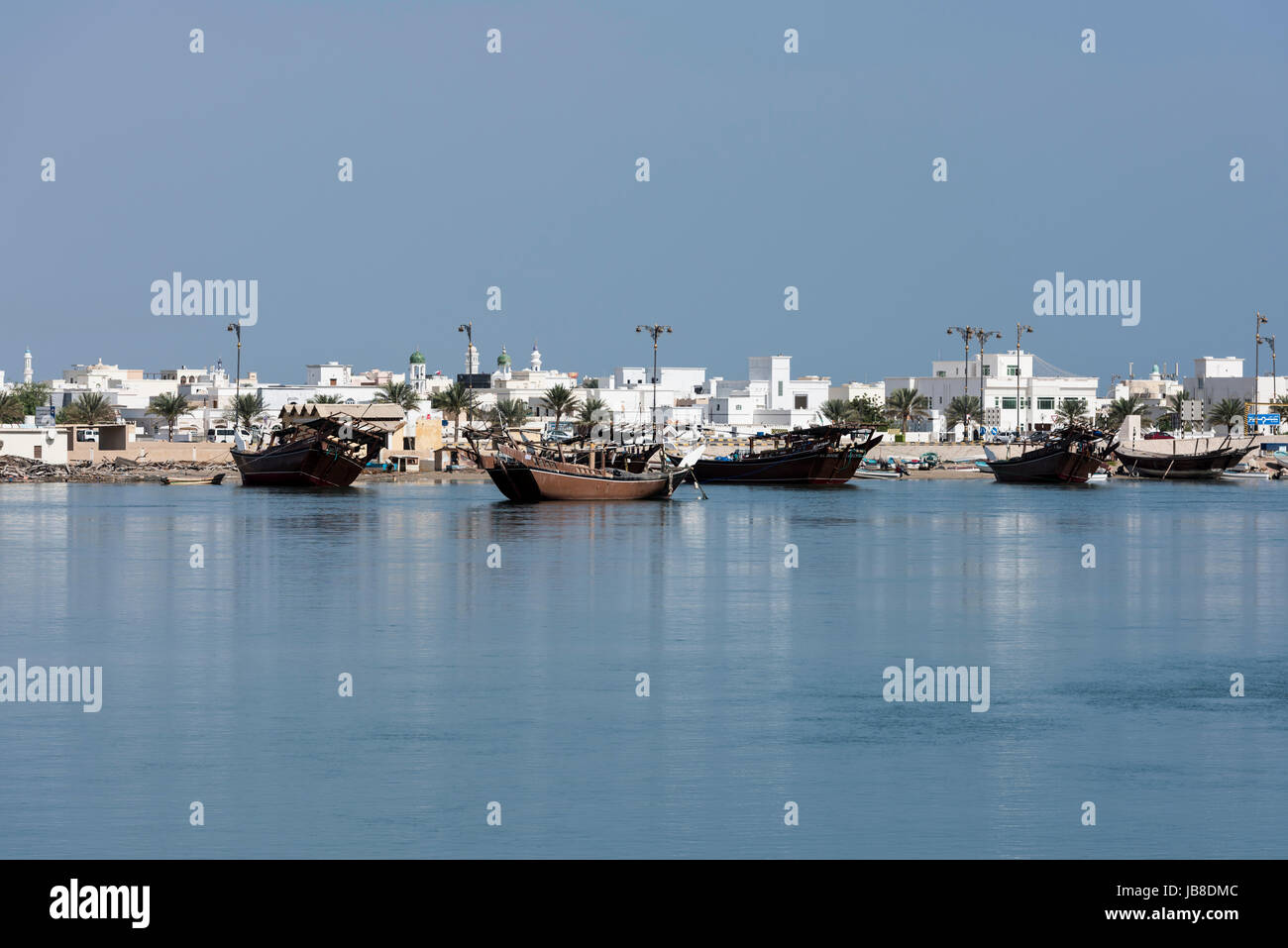 View of a boat factory in Sur, Oman, where traditional wooden dhows are ...