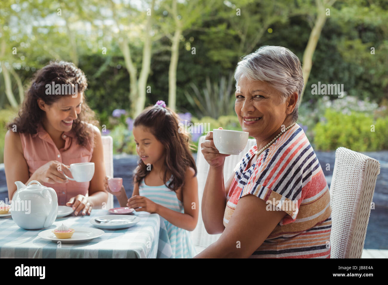 Family having tea hi-res stock photography and images - Alamy