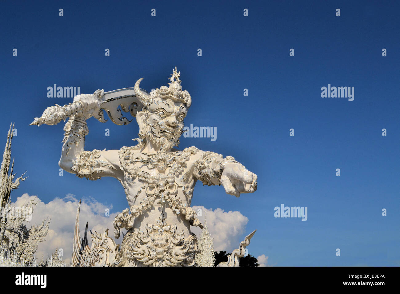 Conceptual sculpture of a demon from Buddhist hell suffering, asking ...