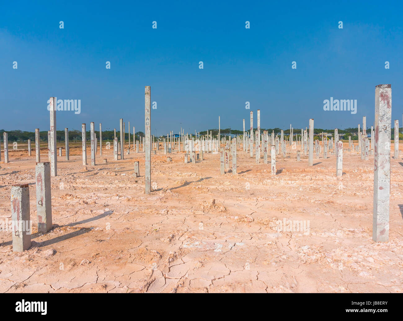 Piling work at construction site with blue skies background Stock Photo ...