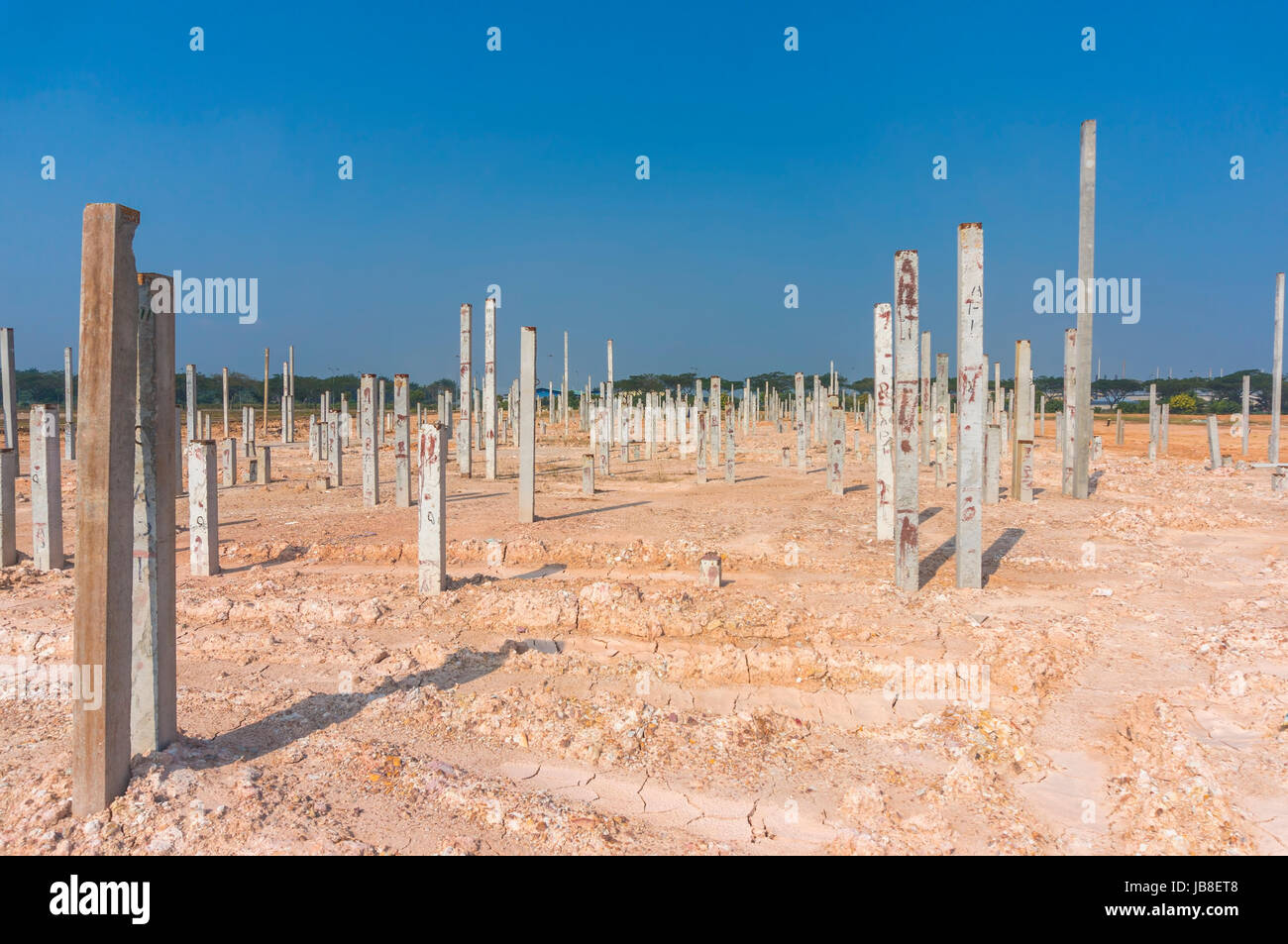 Piling work at construction site with blue skies background Stock Photo ...