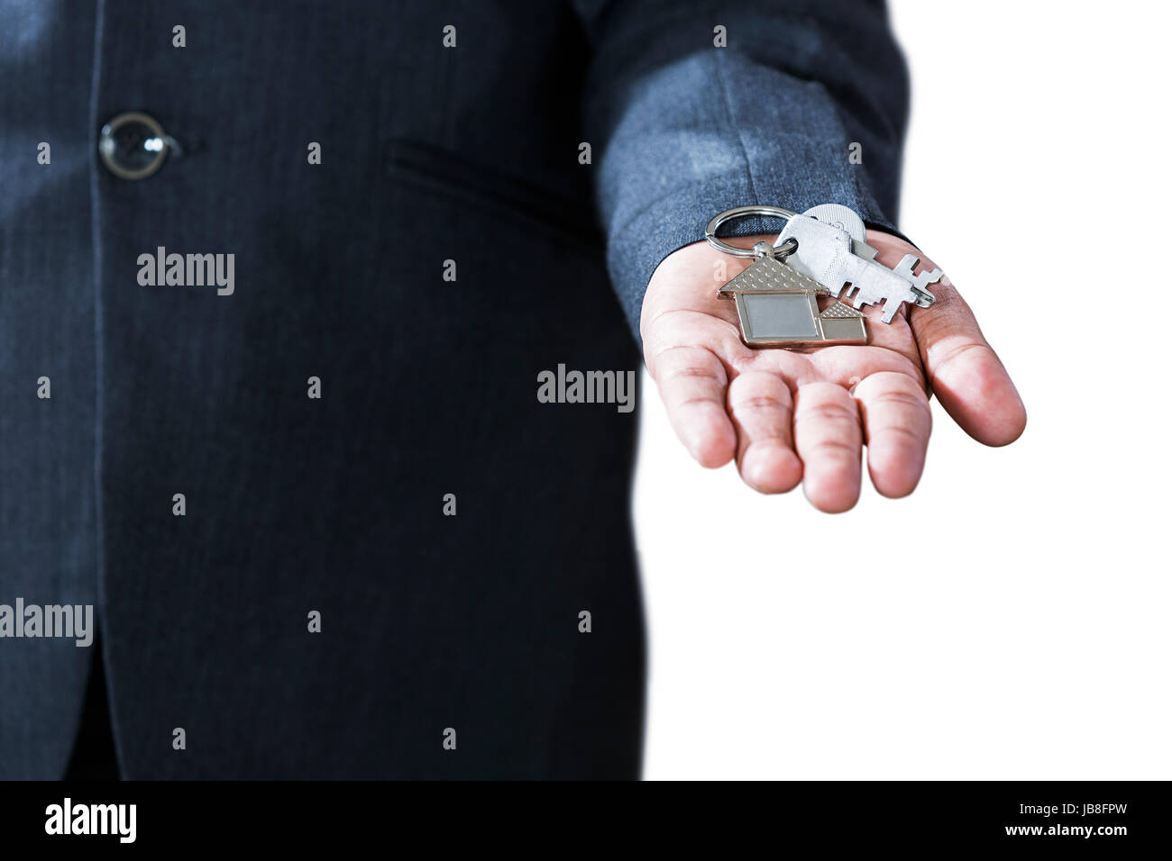 Business man holding key new hi-res stock photography and images - Alamy