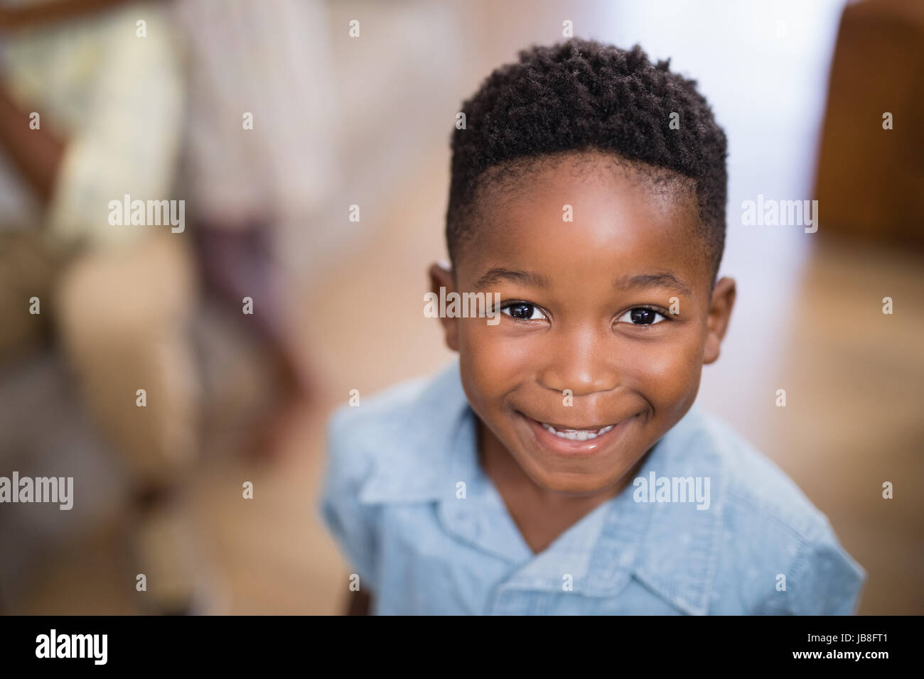Close up portrait of smiling boy at home Stock Photo - Alamy