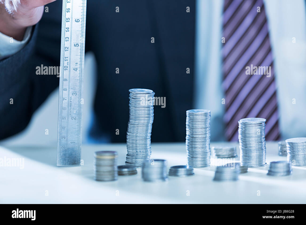 Man holding ruler hi-res stock photography and images - Alamy